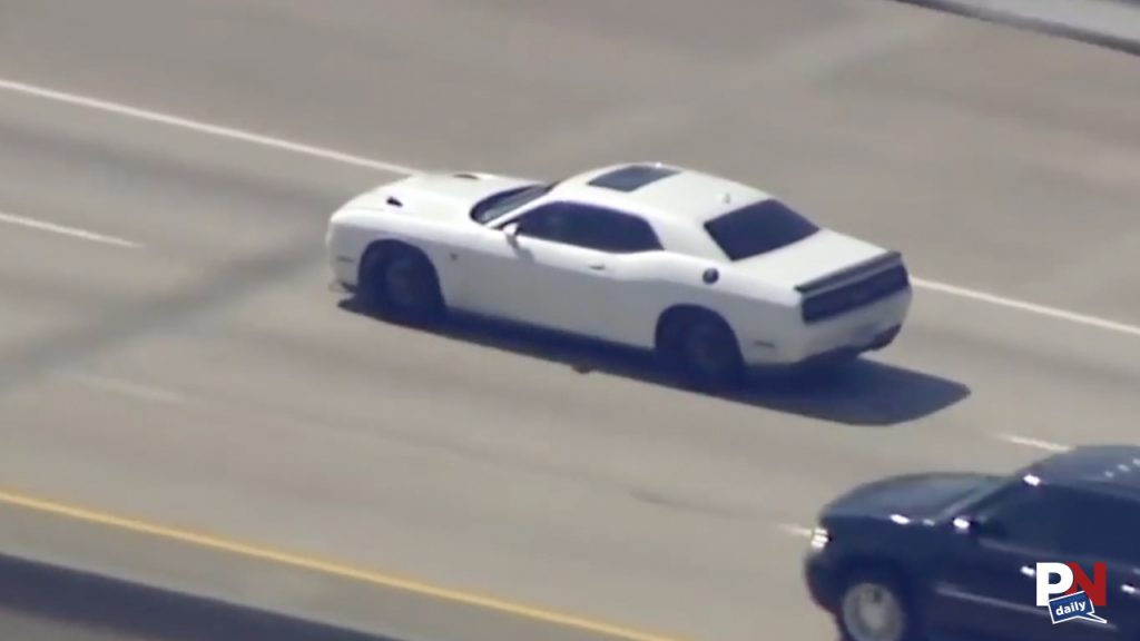 Stolen Dodge Hellcat Outruns A Chopper In Police Chase