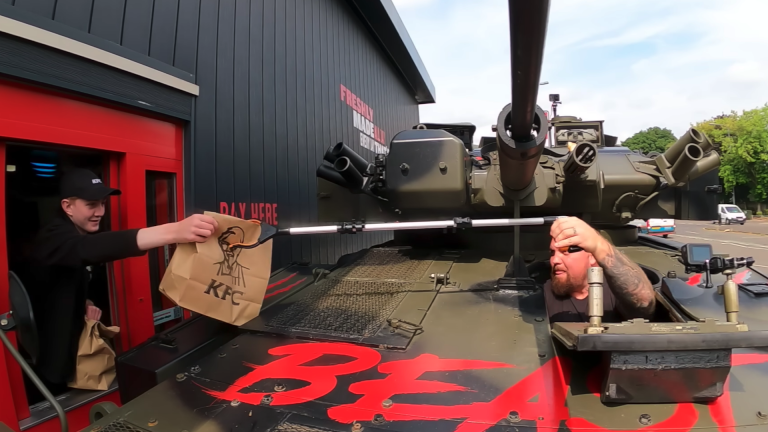 British Strongman Drives a Real Tank Through a KFC Drive-Thru