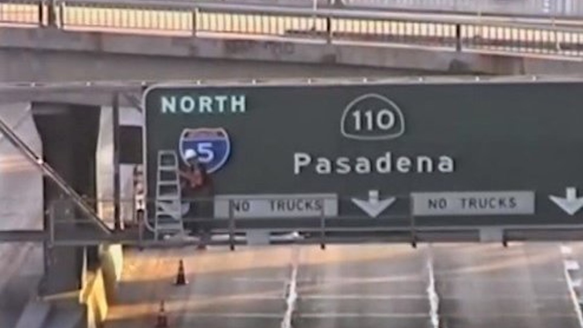 This Street Artist Vandalized a Freeway Sign That Actually Improved Traffic